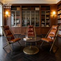China Modern Minimalist Gold Metal Windsor Lounge Chair Industrial Luxury Segmented Leather High Back Armchair Living Room & Hotel Use for sale