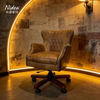 China Luxury Western Cowhide Leather Executive Office Chair Swivel Desk Chair with Solid Wood Base & Nailhead Trim for sale