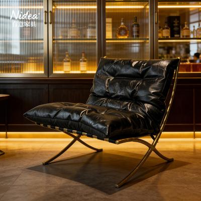 China Modern Midcentury Handmade Luxury Black Distressed Leather Lounge Chair with Antique Gold X-Frame for Living Room Club Bar for sale