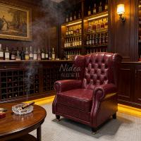 China Luxury Vintage Wine Red Leather Chesterfield Wingback Armchair Tufted Design Ergonomic Durable Build Brass Casters Club Bar for sale