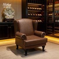 China Vintage Brown Genuine Leather Wingback Armchair with Nailhead Trim Durable Wood Legs for Living Room Leisure for sale