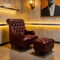China Luxury Wine Red Leather Chesterfield High Back Armchair with Ottoman Set Classic Tufted Scrolled Back Reading Chair for Club for sale