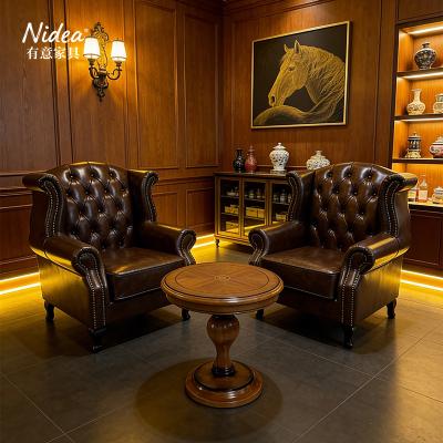 China Luxury Vintage Brown Leather Wingback Chesterfield Chair Classic Deep Button Tufted Armchair Nailhead Trim Living Room Office for sale