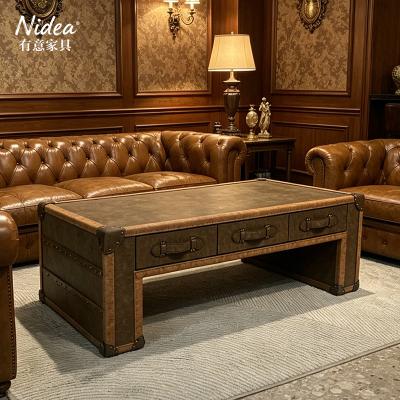 China Luxury Vintage Leather Coffee Table with 3 Drawers Handmade Campaign Style for Home Bar & Living Room Brass Corners & Rivets for sale