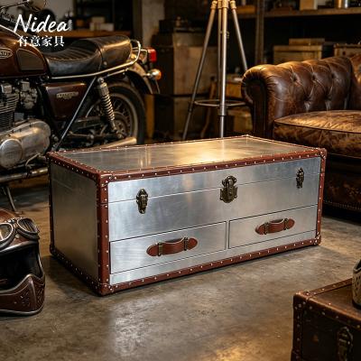 China Industrial Aviator Aluminum Trunk Coffee Table Vintage Storage Chest with Burgundy Leather Trim Drawers for Home Bar Living Room for sale