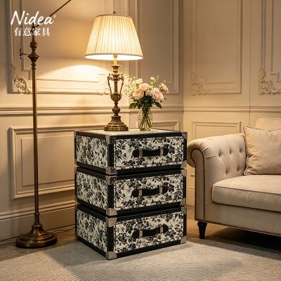 China Vintage Floral Trunk Storage Cabinet 360-Degree Rotating 3-Drawer Nightstand French Chic Leather End Table for Bedroom for sale