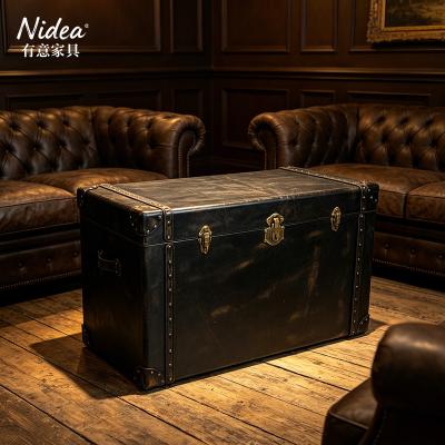 China Vintage Distressed Leather Trunk Coffee Table Industrial Lift-Top Storage Chest Antique Brass Hardware Campaign Box for sale