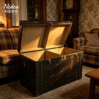 China Vintage Distressed Leather Trunk Coffee Table Industrial Lift-Top Storage Chest Antique Brass Hardware Campaign Box for sale