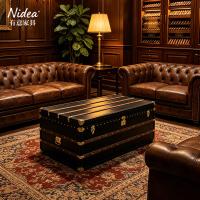 China Luxury Vintage Black Leather Trunk Coffee Table with Wood Slats Gold Hardware Storage Chest and Side Drawers for Home Bar for sale