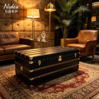 China Luxury Vintage Black Leather Trunk Coffee Table with Wood Slats Gold Hardware Storage Chest and Side Drawers for Home Bar for sale
