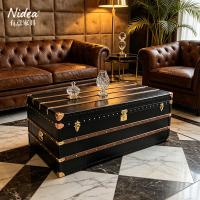 China Luxury Vintage Black Leather Trunk Coffee Table with Wood Slats Gold Hardware Storage Chest and Side Drawers for Home Bar for sale