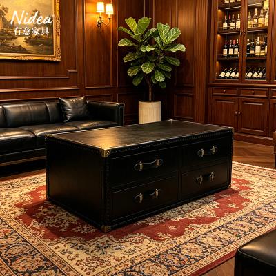 China Black Leather Trunk Coffee Table Vintage Campaign Center Table with 4 Storage Drawers and Brass Corners for sale