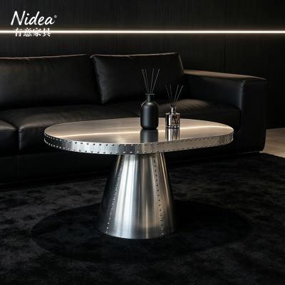 China Modern Industrial Aviator Aluminum Coffee Table Round Riveted Metal Center Table Industrial Conical Pedestal Accent Table for sale
