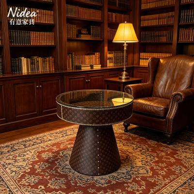 China Luxury Monogram Leather Round Side Table Vintage Nailhead Accent End Table with Glass Top Designer Style Pedestal Coffee Table for sale