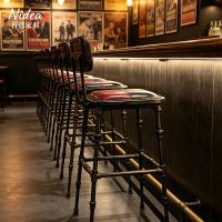 China Industrial Retro Bar Stool Pipe-Style Metal Frame High Chair Vintage Patchwork Leather Bar Seat for Cafe Pub Tavern for sale