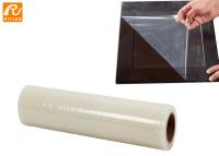 China PE Protective Lamination Film Roll 50-80 Micron Thickness for Solid Surfaces - 10mm to 1240mm Width Options for sale