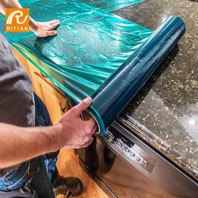 China High Strength PE Protective Film 50 Micron Rubber Based Adhesive Residue Free Removal 6 Months UV Resistance for sale