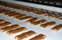 China P330 Automatic Nougat Toffee Candy Bar Forming Cutting Machine 100-200KG/H PLC Servo Controlled for sale