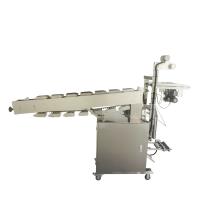 China Individual Date Ball Packaging Machine 60-120 PPM Food Grade Automatic Sealer for sale