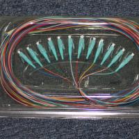 China LC UPC Multimode OM3 Ribbon Fanout Pigtail Kit 850nm 0.9mm OD 12 Fiber for sale