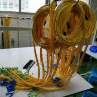 China 12 Core G657A1 Singlemode SC to LC Pre Terminated Fiber Optic Cable 100M LSZH for sale
