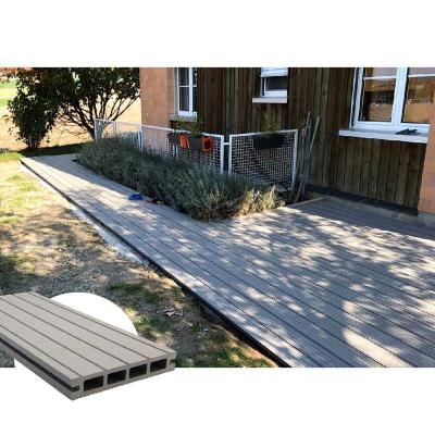 China Red Pine Environmentally Friendly Hollow Composite Decking Trim Warranty 30 Years for sale