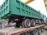 China Used Sinotruk HOWO 8x4 Dump Truck 375hp 12 Tires Manual Transmission Green for sale