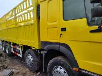China Secondhand Sinotruk HOWO 8x4 Cargo Truck 12 Wheels Weichai 375hp 8.2m Cargo Tank for sale