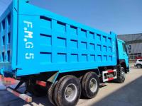 China Sinotruk HOWO 6x4 Blue Dump Truck 351-450hp Tipper Truck with 12.00R20 Radial Tires for sale