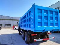 China Sinotruk HOWO 6x4 Blue Dump Truck 351-450hp Tipper Truck with 12.00R20 Radial Tires for sale
