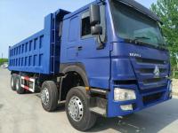 China Used Sinotruk HOWO 8x4 Dump Truck 351-420hp Right Hand Drive Blue for sale