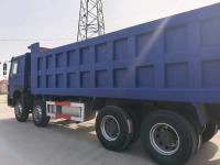 China Used Sinotruk HOWO 8x4 Dump Truck 351-420hp Right Hand Drive Blue for sale