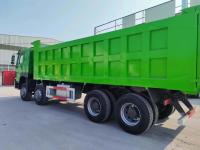 China Sinotruk HOWO 8x4 Dump Truck 375HP Green Used Heavy Duty 41-50T Capacity for sale