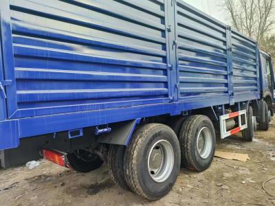 China Sinotruk HOWO 8x4 Blue Used Box Truck 351-420hp Euro 2 12-Speed Manual 41-50T Load Capacity for sale