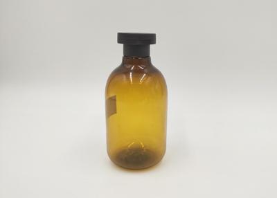 China 250ml Amber Boston PET Plastic Cosmetic Bottle with Pump for Shampoo Lotion Hand Sanitizer for sale