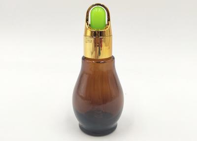 China 30ml Amber Glass Dropper Bottle with Gold Cap for Essential Oil Packaging for sale