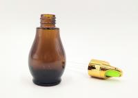 China 30ml Amber Glass Dropper Bottle with Gold Cap for Essential Oil Packaging for sale