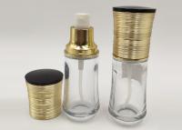 China 30ml Transparent Glass Cosmetic Bottle with Lotion Pump Macrame Golden Design for sale
