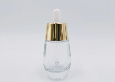 China 1oz 30ml Clear Glass Dropper Bottle with Golden or Silver Cap for Skincare Packaging for sale
