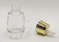 China 1oz 30ml Clear Glass Dropper Bottle with Golden or Silver Cap for Skincare Packaging for sale