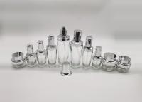 China 20ml 50ml Transparent Emulsion Spray Glass Bottle with Silver Pressure Pump for sale