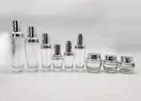 China 20ml 50ml Transparent Emulsion Spray Glass Bottle with Silver Pressure Pump for sale