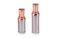 China 20ml 30ml 50ml Gold Acrylic Empty Cosmetic Bottle Set with Custom Color Lotion Pump for sale