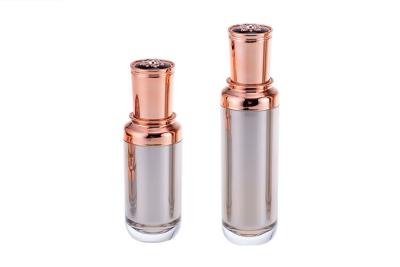 China 20ml 30ml 50ml Gold Acrylic Empty Cosmetic Bottle Set with Custom Color Lotion Pump for sale
