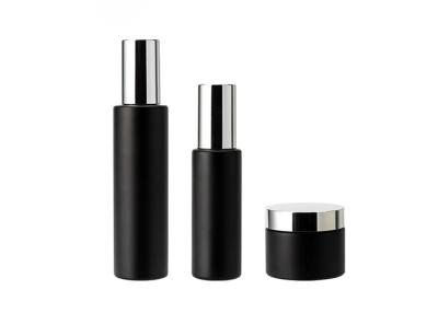 China Round Matte Frosted 50ml Black Glass Cosmetic Bottles with Sprayer for sale