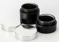 China Round Matte Frosted 50ml Black Glass Cosmetic Bottles with Sprayer for sale