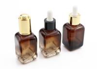 China 30ml Amber Square Glass Cosmetic Bottles for Essential Oil Serum with Pump for sale
