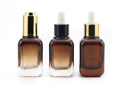 China 30ml Amber Square Glass Cosmetic Bottles for Essential Oil Serum with Pump for sale