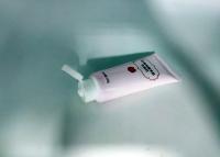 China 100ml Custom Color Plastic Cosmetic Tubes With Lotion Pump for sale