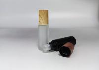 China 10ml Frosted Matte Roll On Glass Bottle with Bamboo Cap for Essential Oils for sale